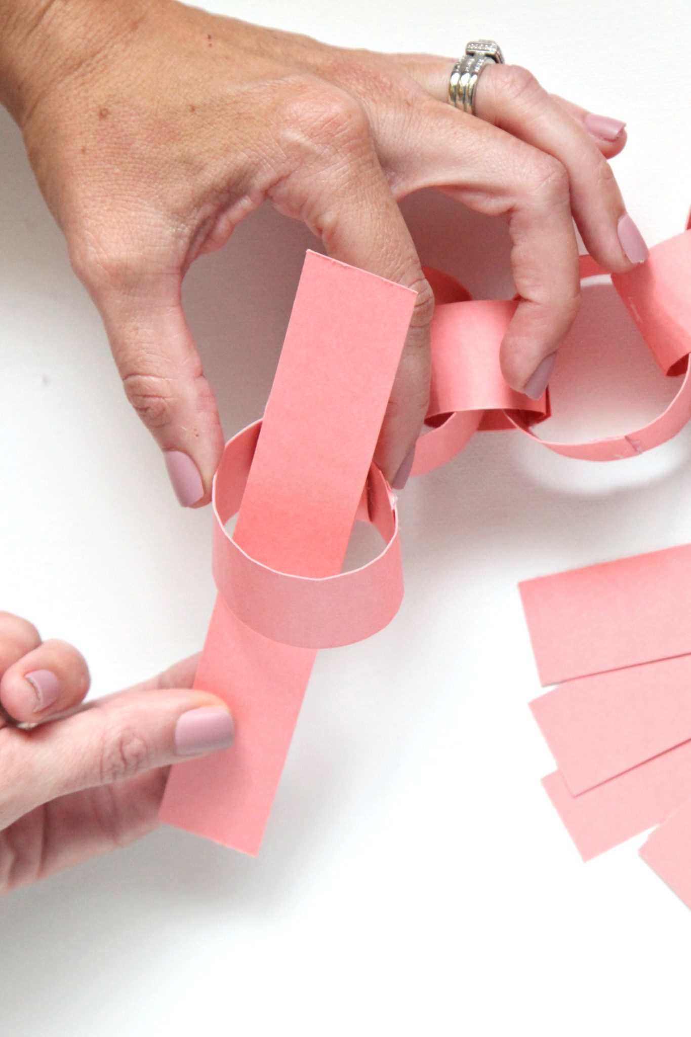 DIY Paper Chain Rainbow Wall Hanging | The Pretty Life Girls