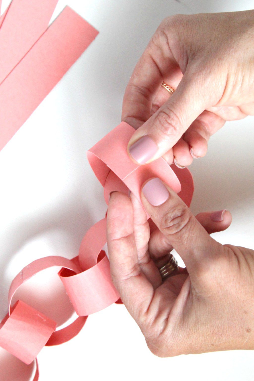 DIY Paper Chain Rainbow Wall Hanging | The Pretty Life Girls