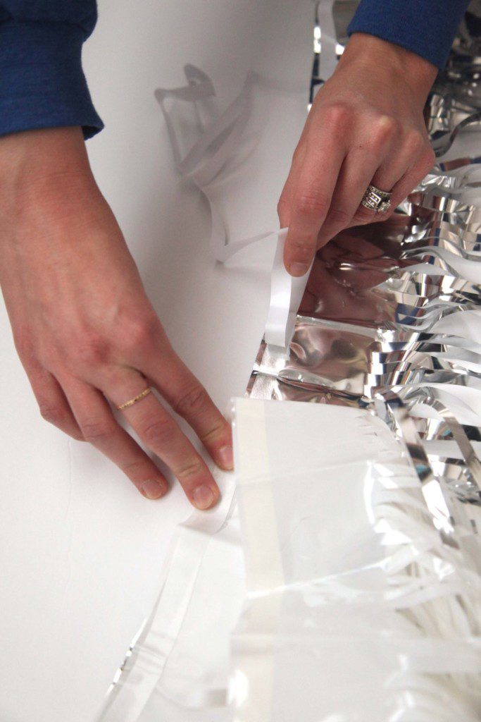 DIY Layered Foil Photo Backdrop | The Pretty Life Girls