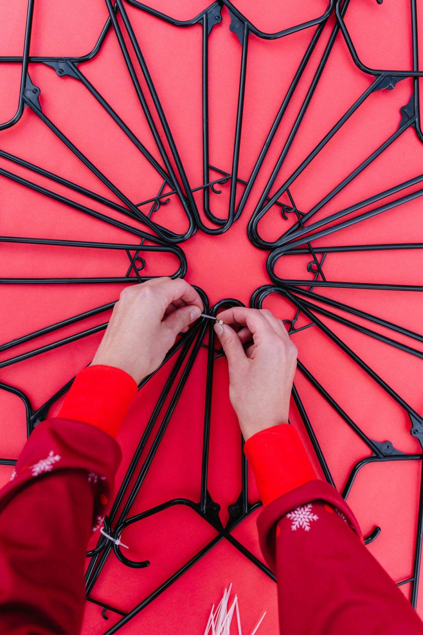DIY Winter Snowflake Backdrop with Hangers | The Pretty Life Girls